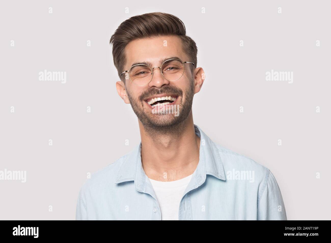 Young playful in eyeglasses hi-res stock photography and images - Alamy