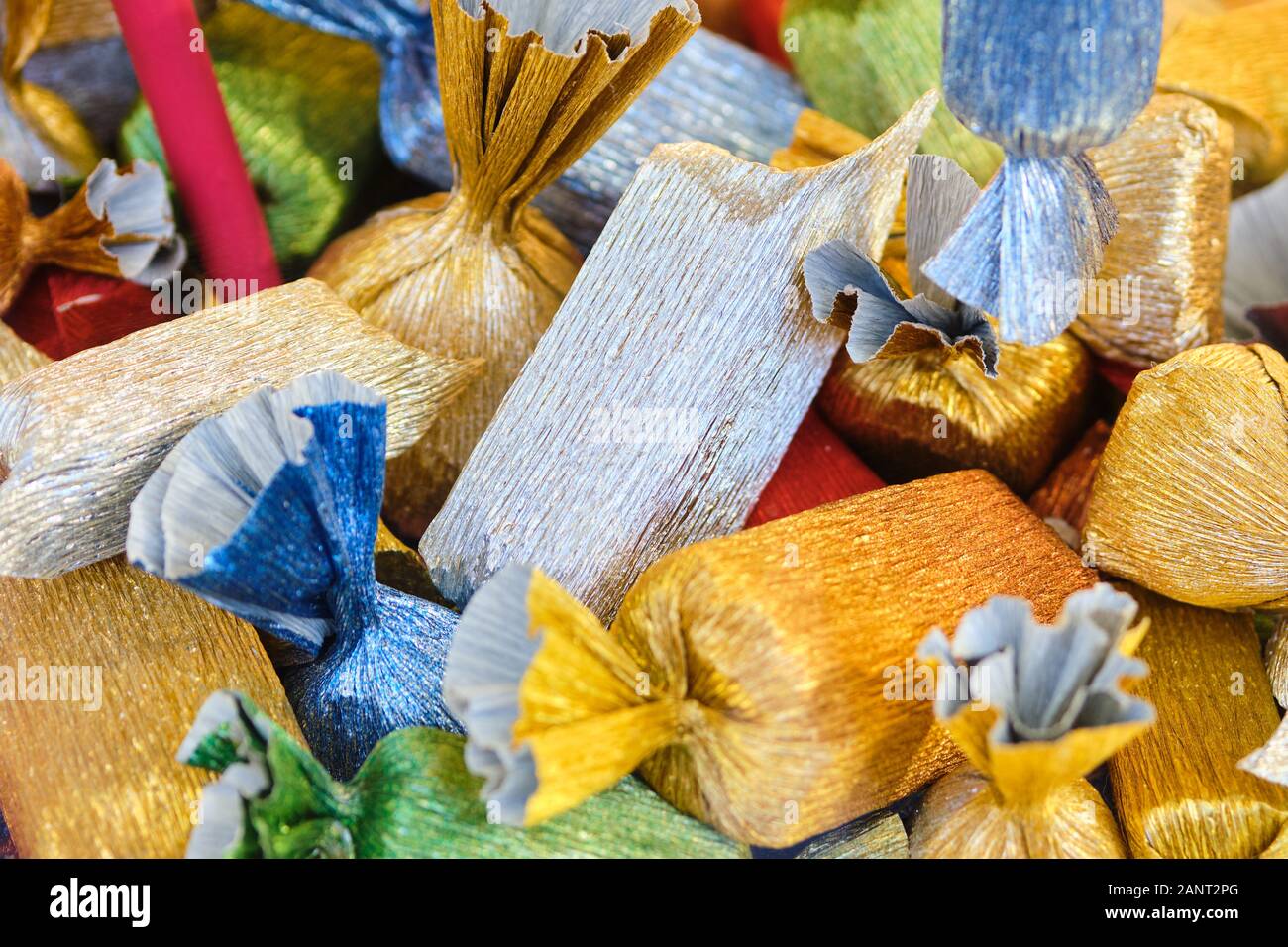Snackcandy in shiny wrappers on the shop window. Close up Stock Photo ...