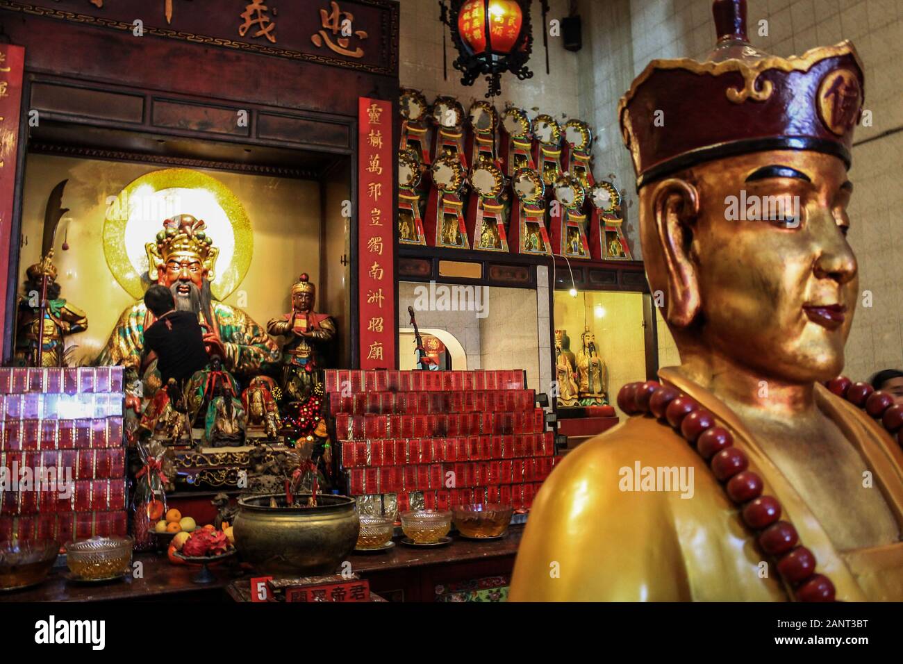 A man cleans a statue during the celebration at Dharma Ramsi temple in ...