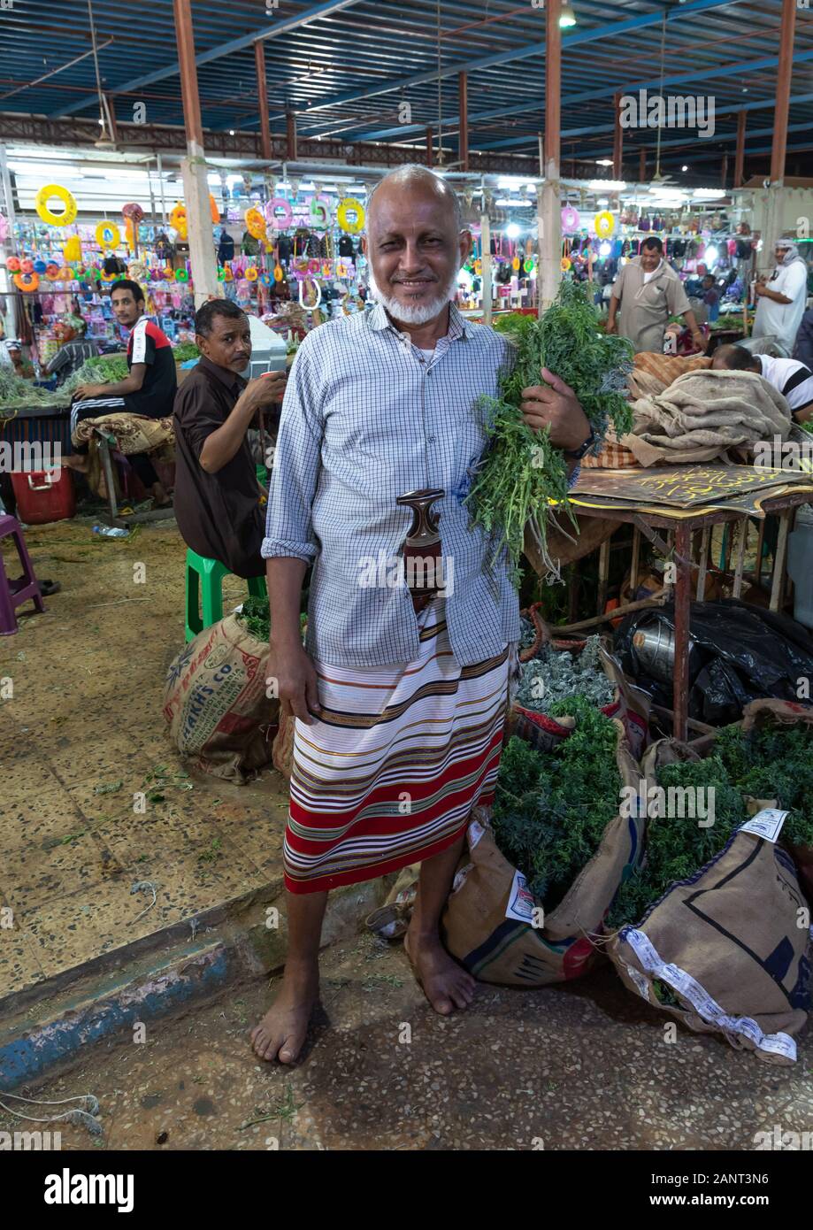 Portrait of a saudi man in a market buying herbs, Jizan province, Sabya ...