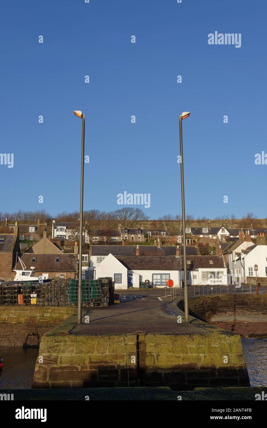 The entrance and lights to the Inner harbour of Johnshaven with the ...