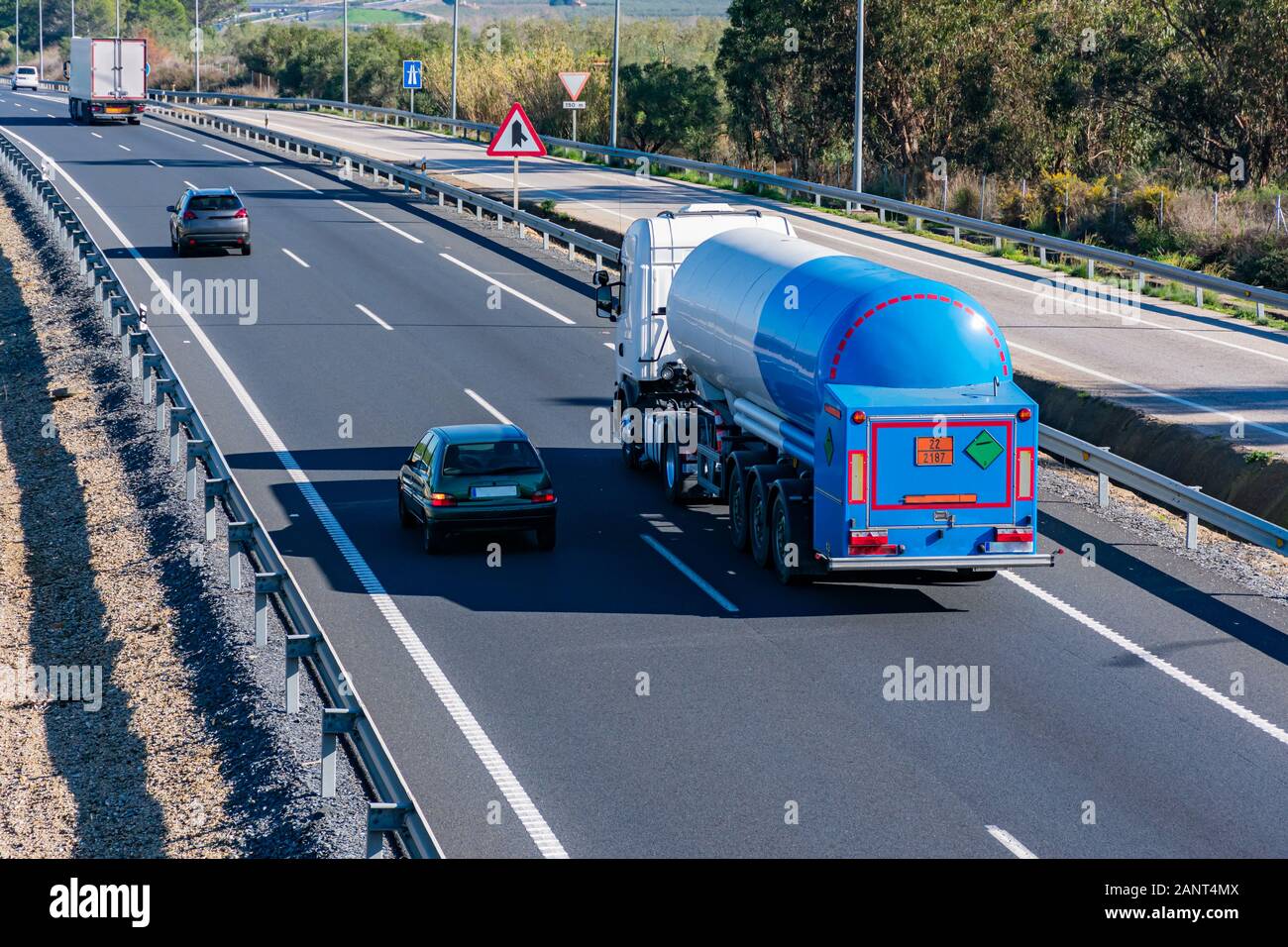 Heavy vehicle driving on the highway Stock Photo - Alamy
