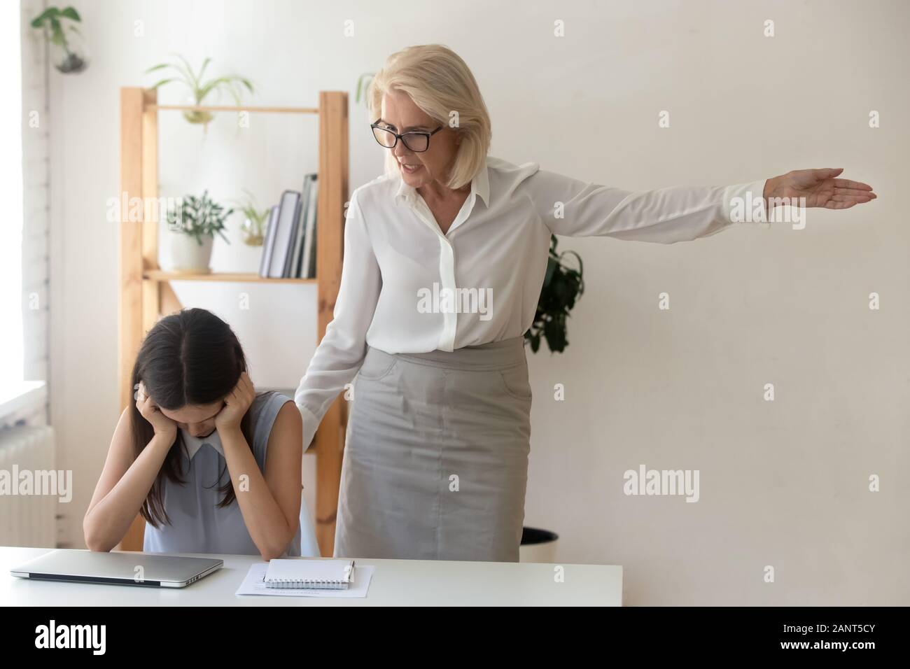 Angry boss dismissing subordinate pointing with hand to door Stock ...