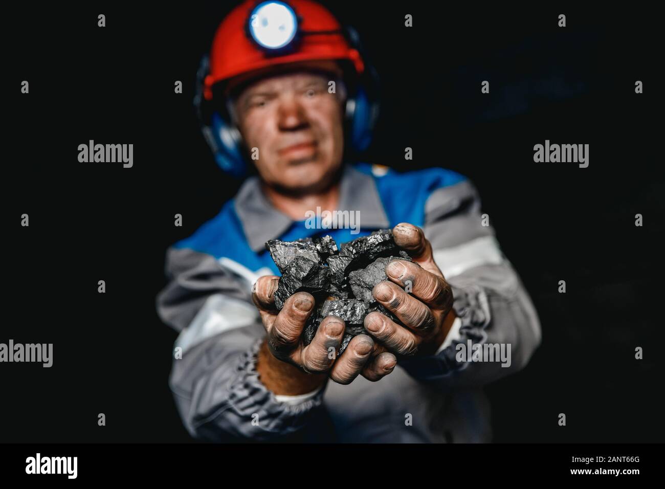 Miner after working on coal mine. Concept industrial engineer Stock ...
