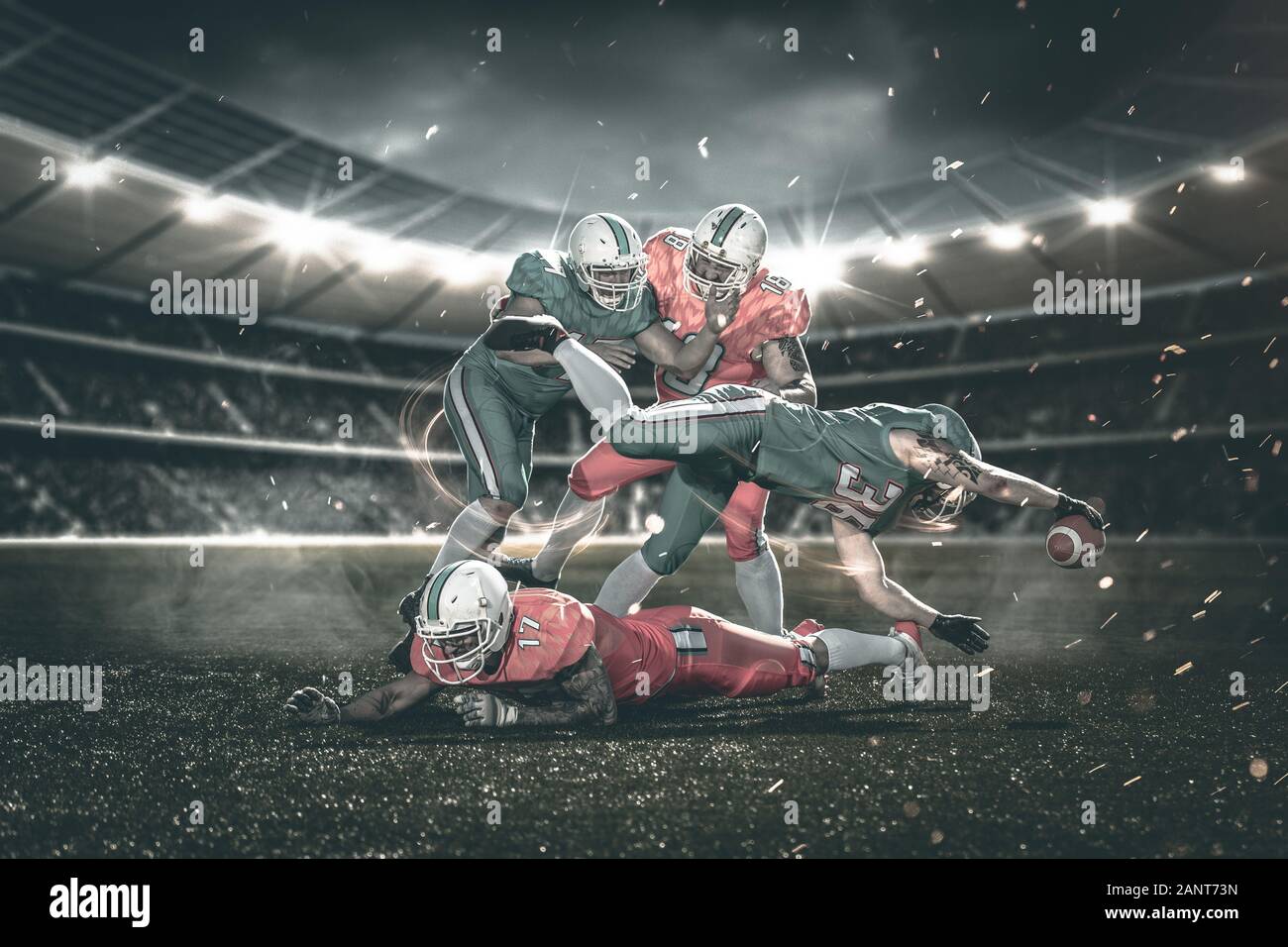 American football player in action on the stadium Stock Photo - Alamy
