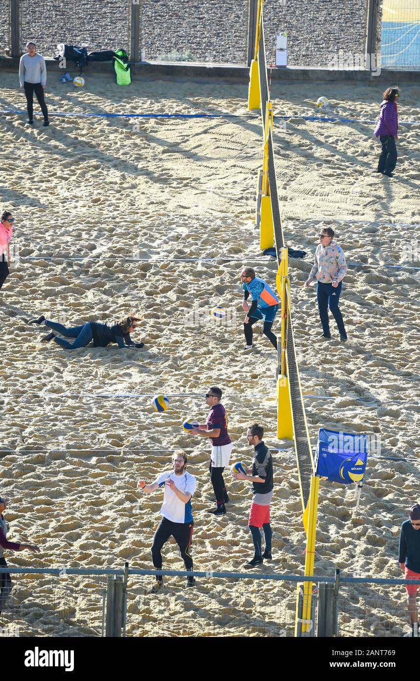 Brighton UK 19th January 2020 - Beach volleyball players enjoy the ...