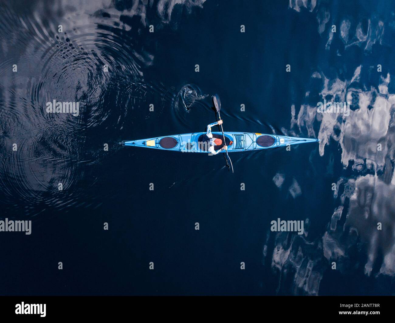 Blue kayak with man sea, open space, aerial top view Stock Photo - Alamy