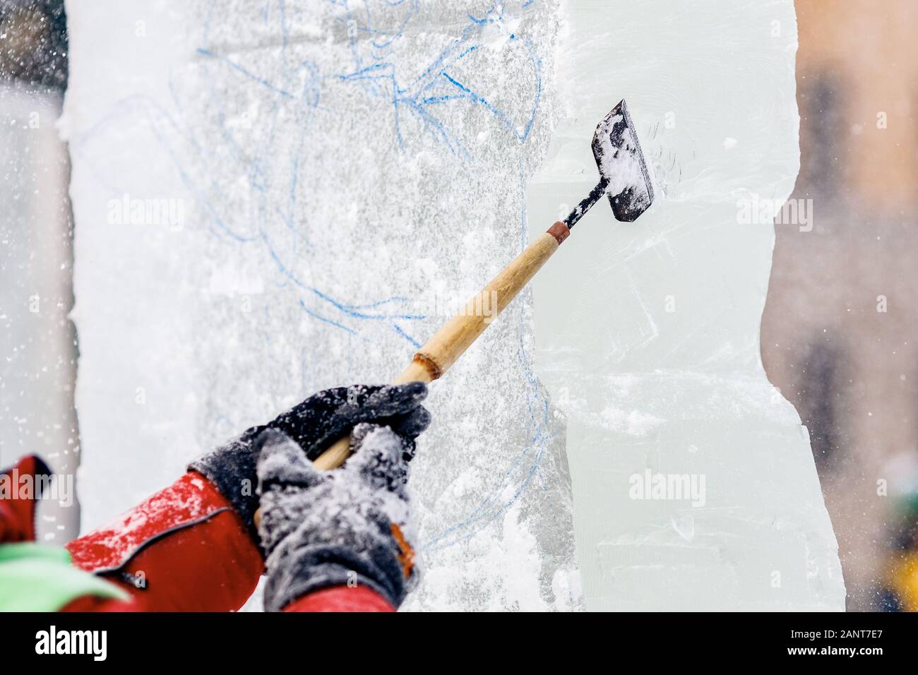 Ice sculpture carving man use chisel cut frozen winter Stock Photo - Alamy