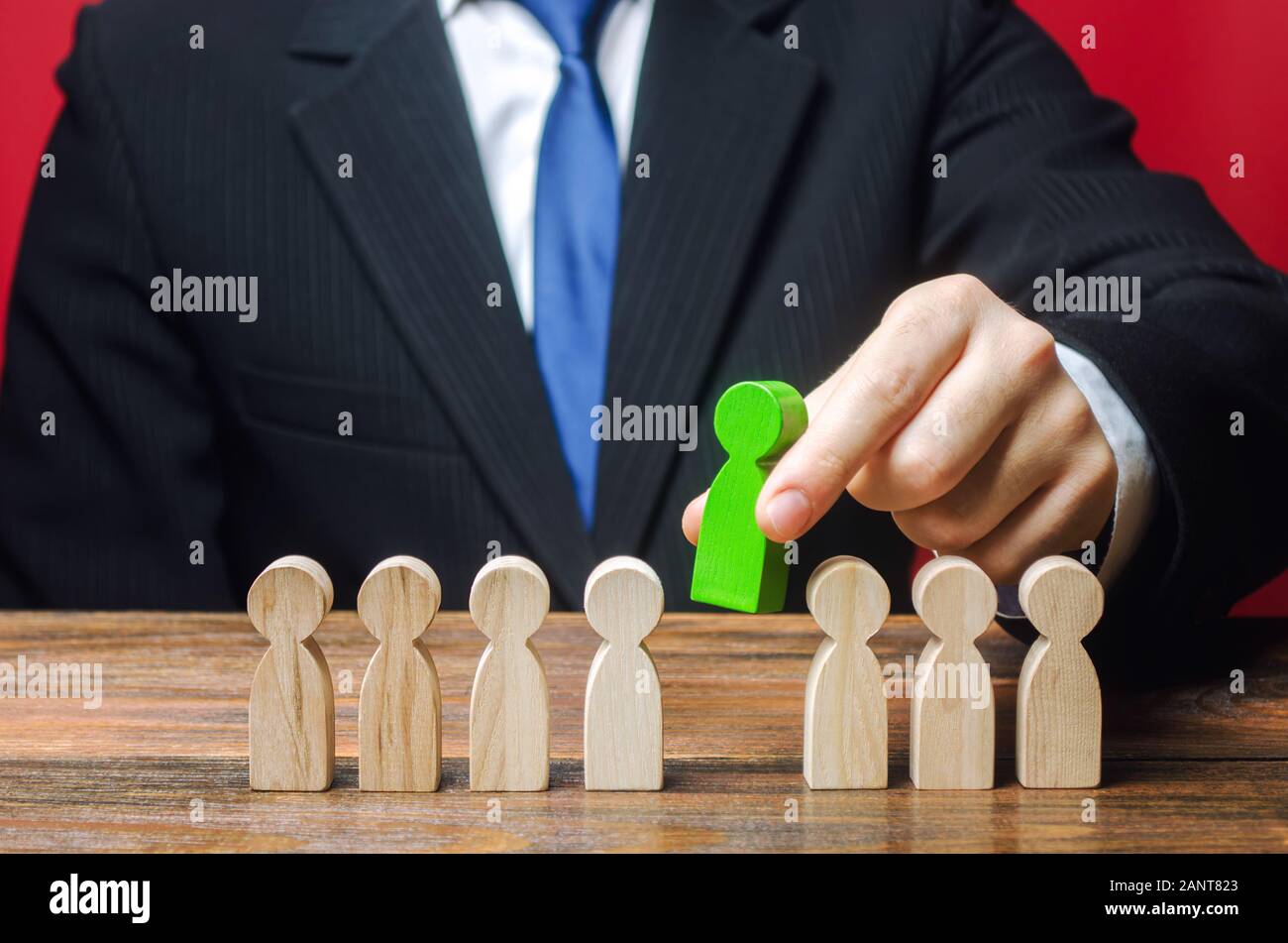 Businessman chooses a person from the team. Leadership and promotion ...