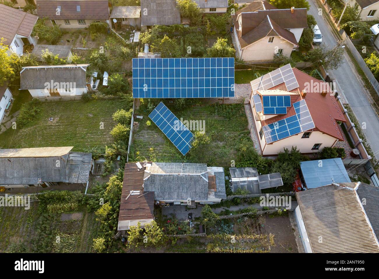 Aerial top view of new modern residential house cottage with blue shiny ...