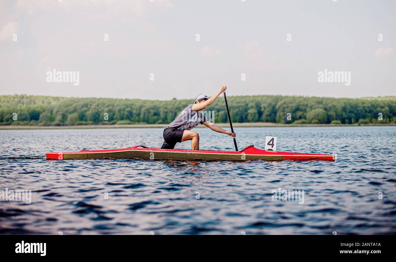 young athlete canoeist rowing canoeing competition race Stock Photo - Alamy