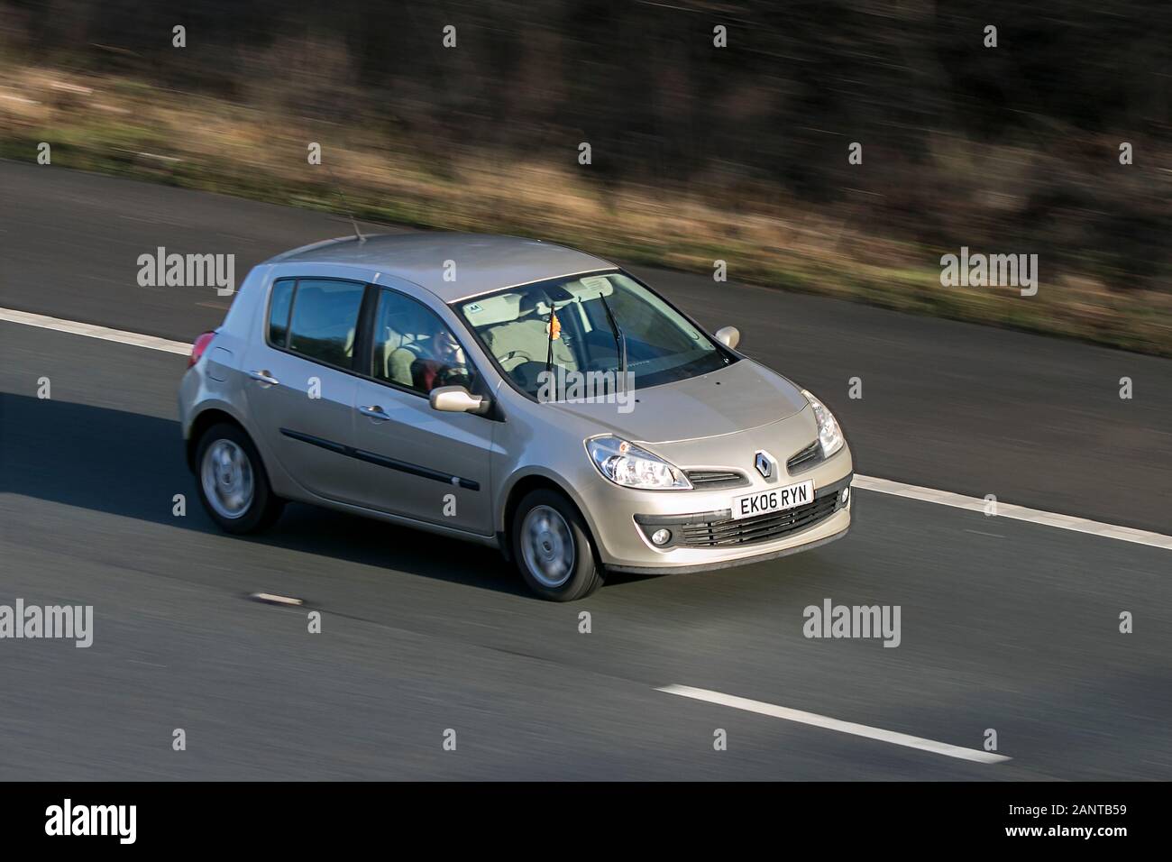 Renault Clio Privilege Gold car petrol driving on the M6 motorway near ...