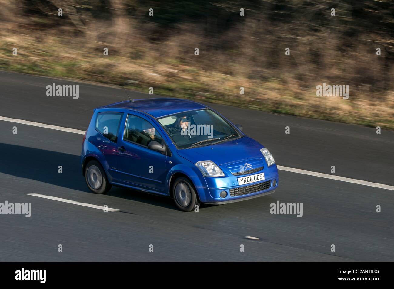 Citroen C2 DESIGN Blue petrol 3 door hatchback driving on the M6 ...