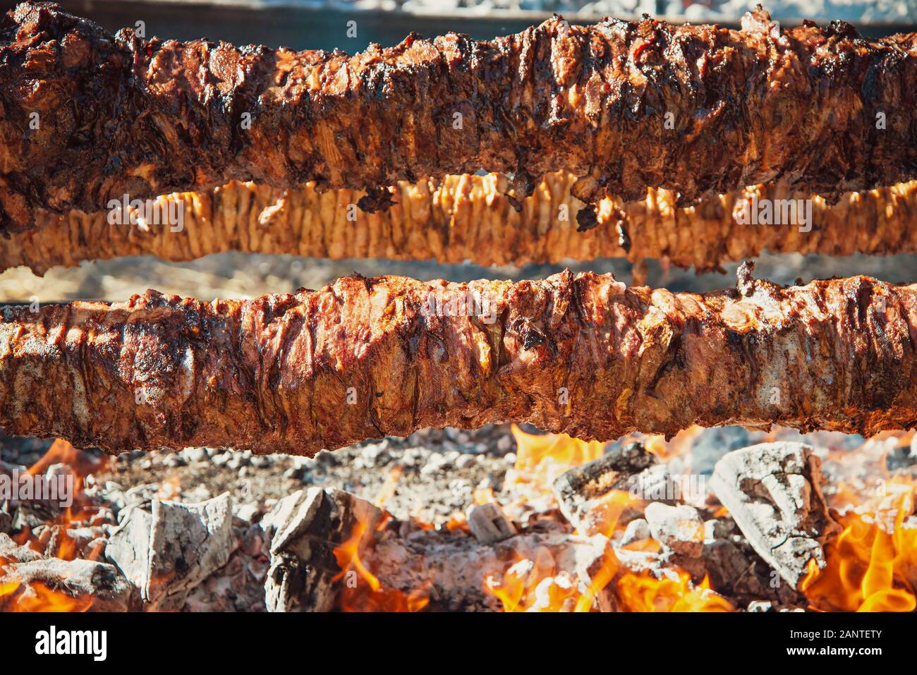 Cooking skewered meat on charcoal hi-res stock photography and images ...