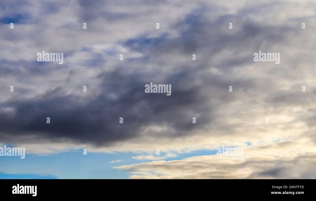 Stunning mixed cloud formations on a deep blue summer sky Stock Photo ...