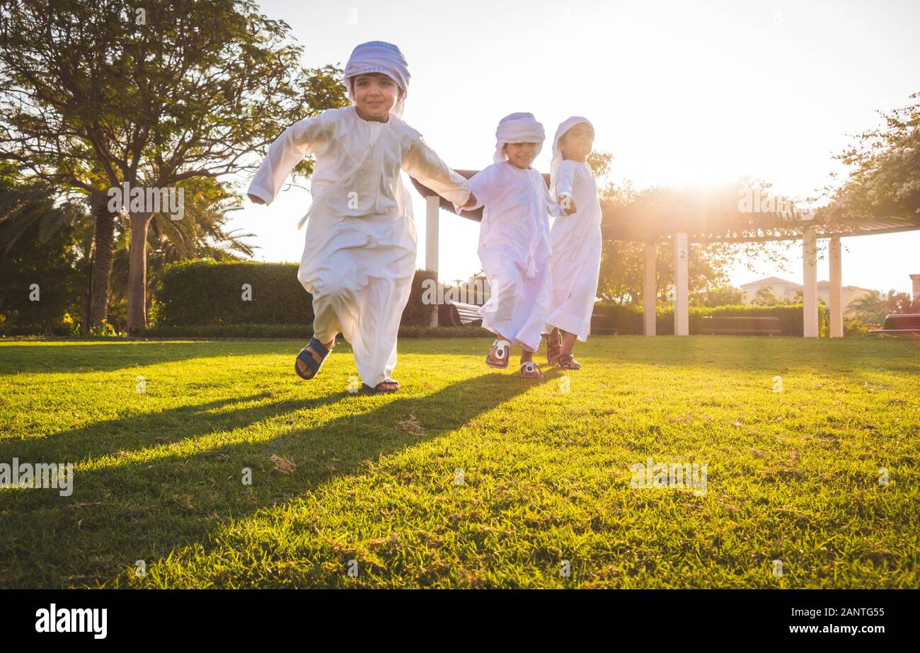 Group of middle-eastern kids playing and having fun outdoors Stock ...