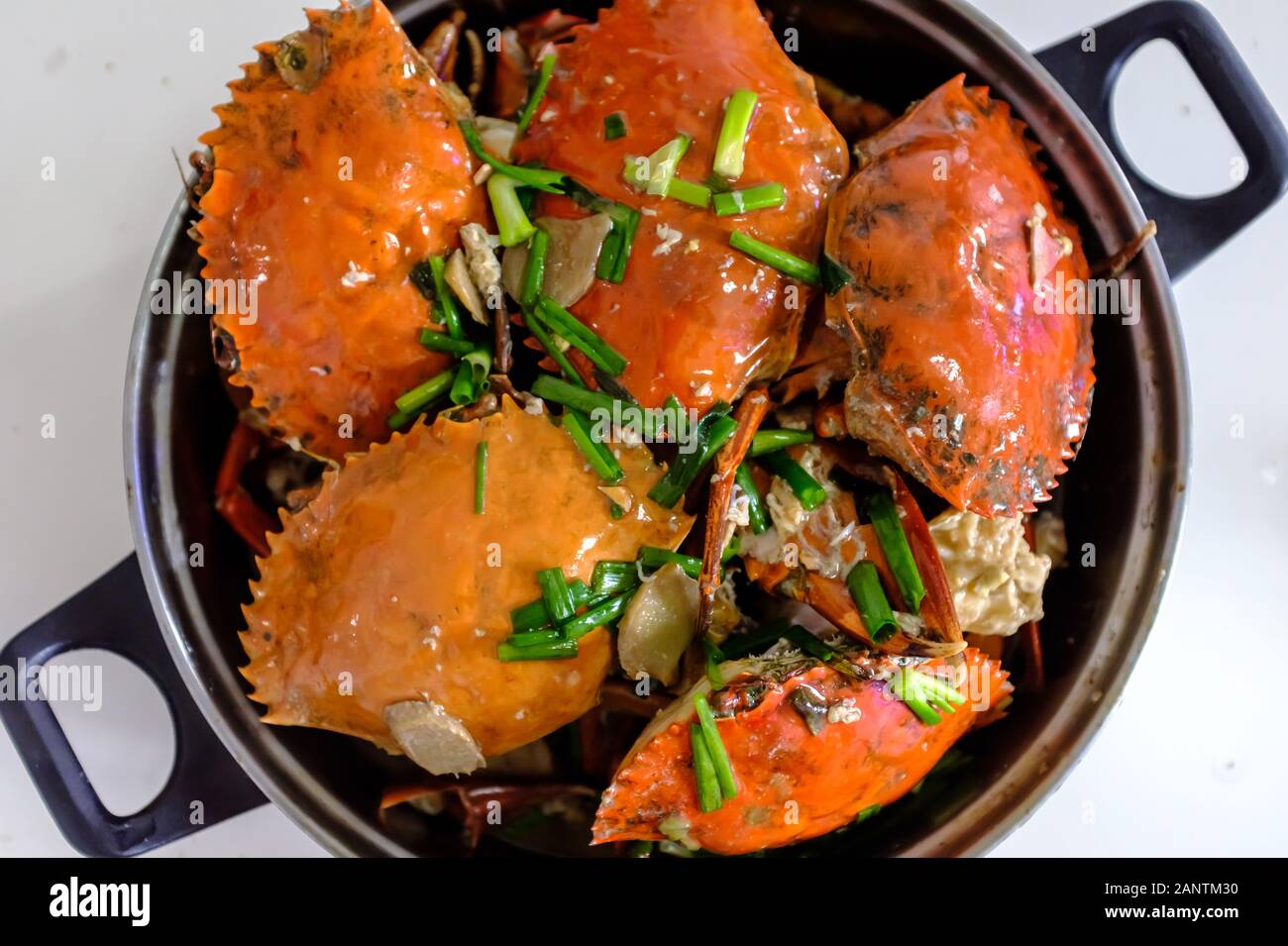 delicious red color crab meal in pot top view Stock Photo - Alamy