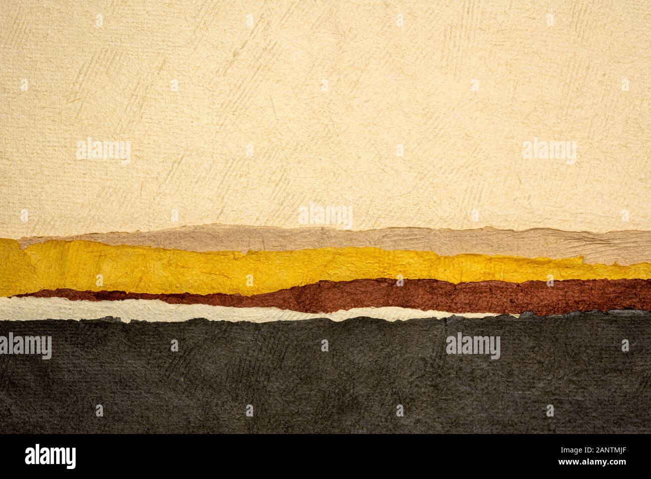 abstract landscape in earth tones created with sheets of textured ...