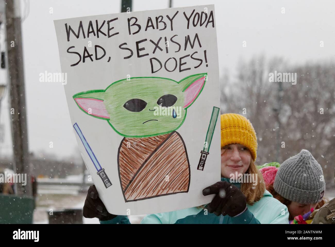 Philadelphia, PA, USA - January 18, 2020: A woman holds up a protest ...