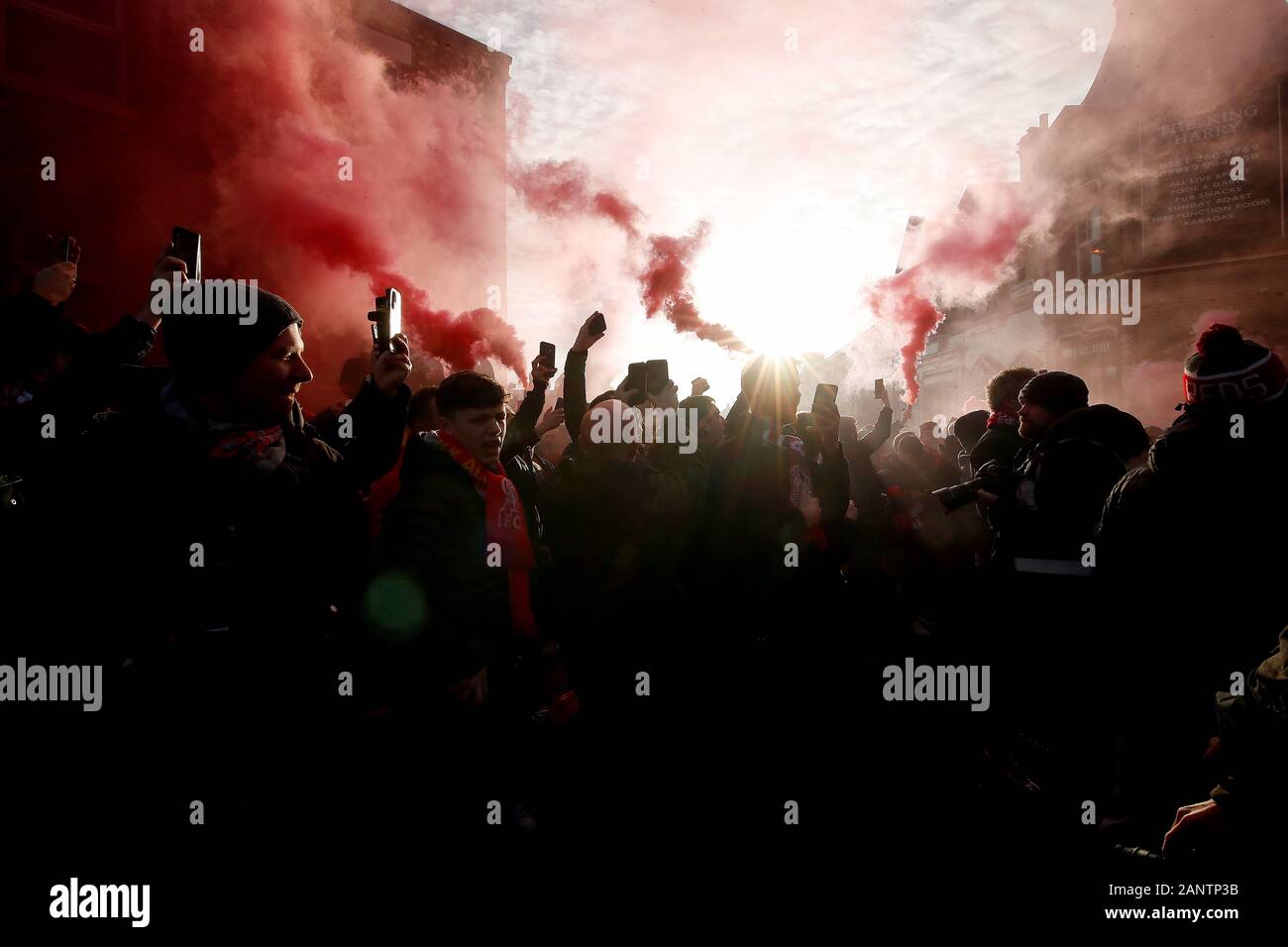 Flares are set off outside the ground ahead of the Premier League match ...
