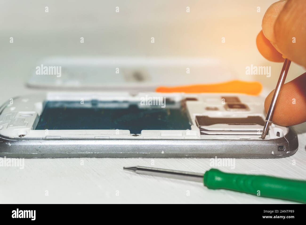 Phone repairs hi-res stock photography and images - Alamy