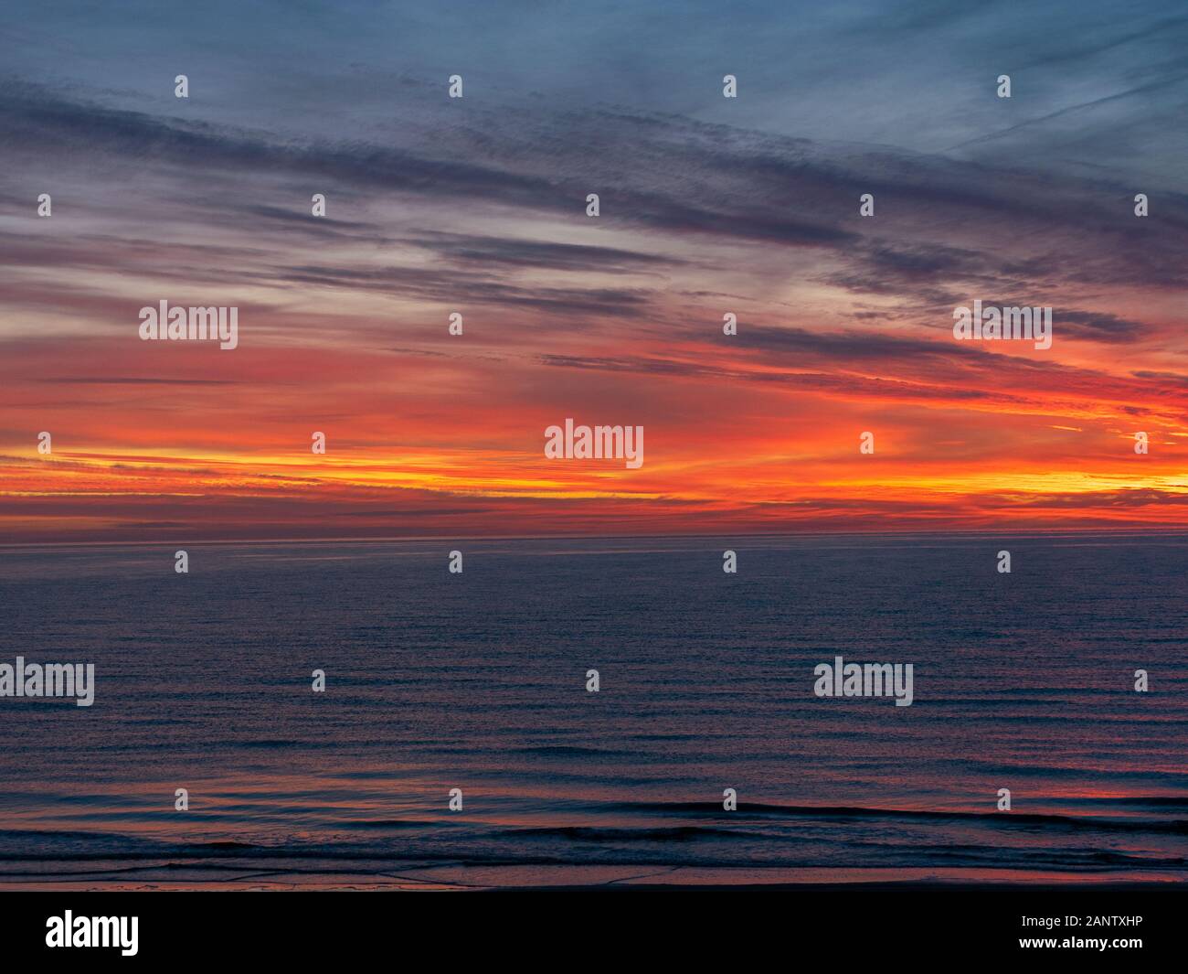 sea sunset landscape with colorful skies and dark water Stock Photo - Alamy