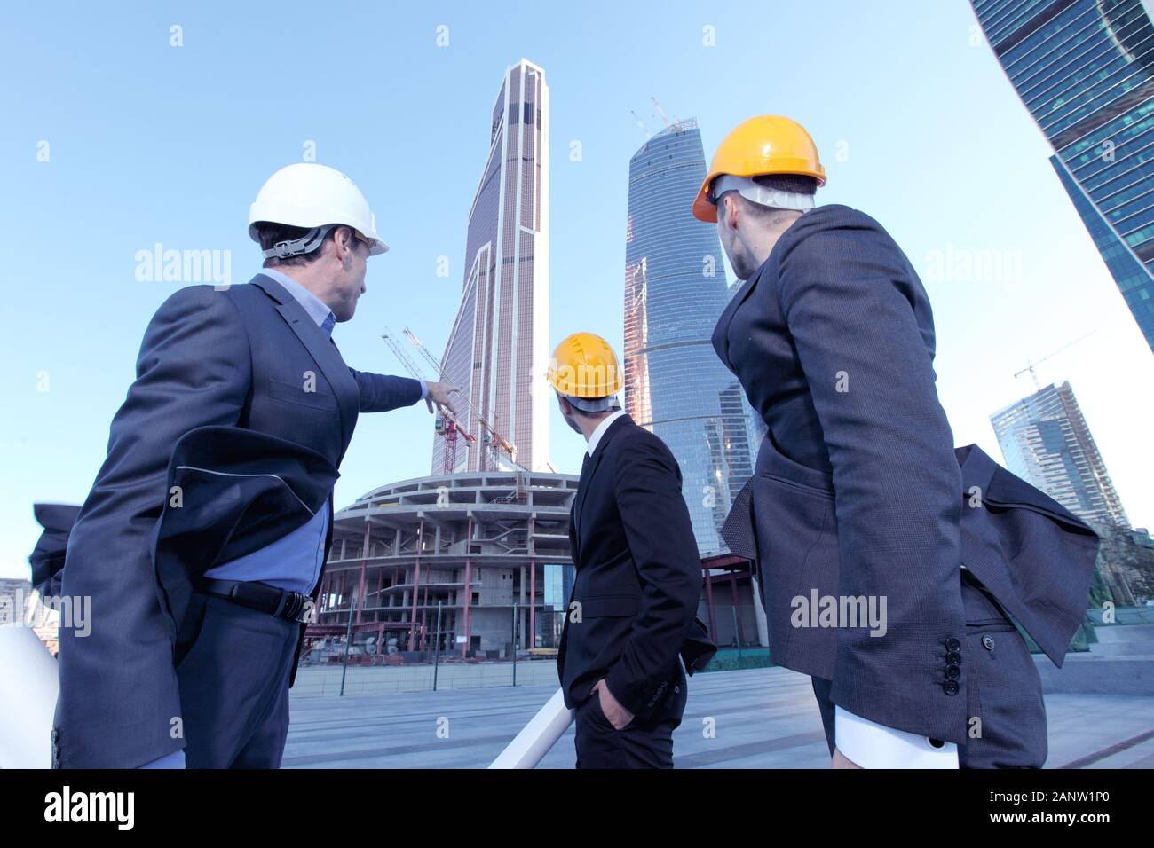 Engineering and architecture concept, engineers working on a building ...