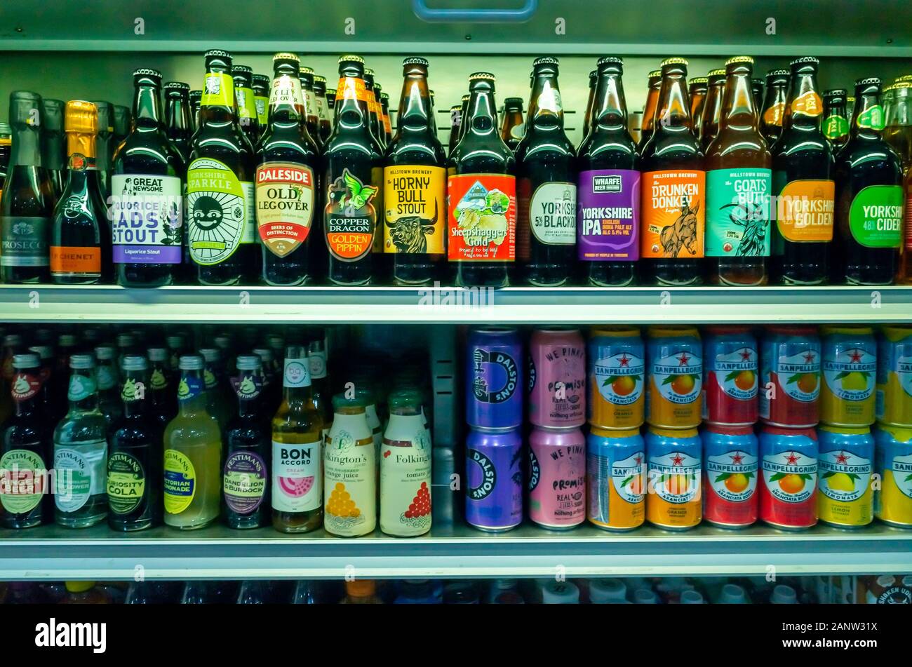 Local bottled Yorkshire beer and San Pellegrino Italian soft drink cans ...