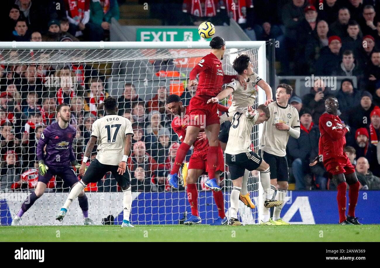 Liverpool's Virgil van Dijk (centre) scores his side's first goal of ...