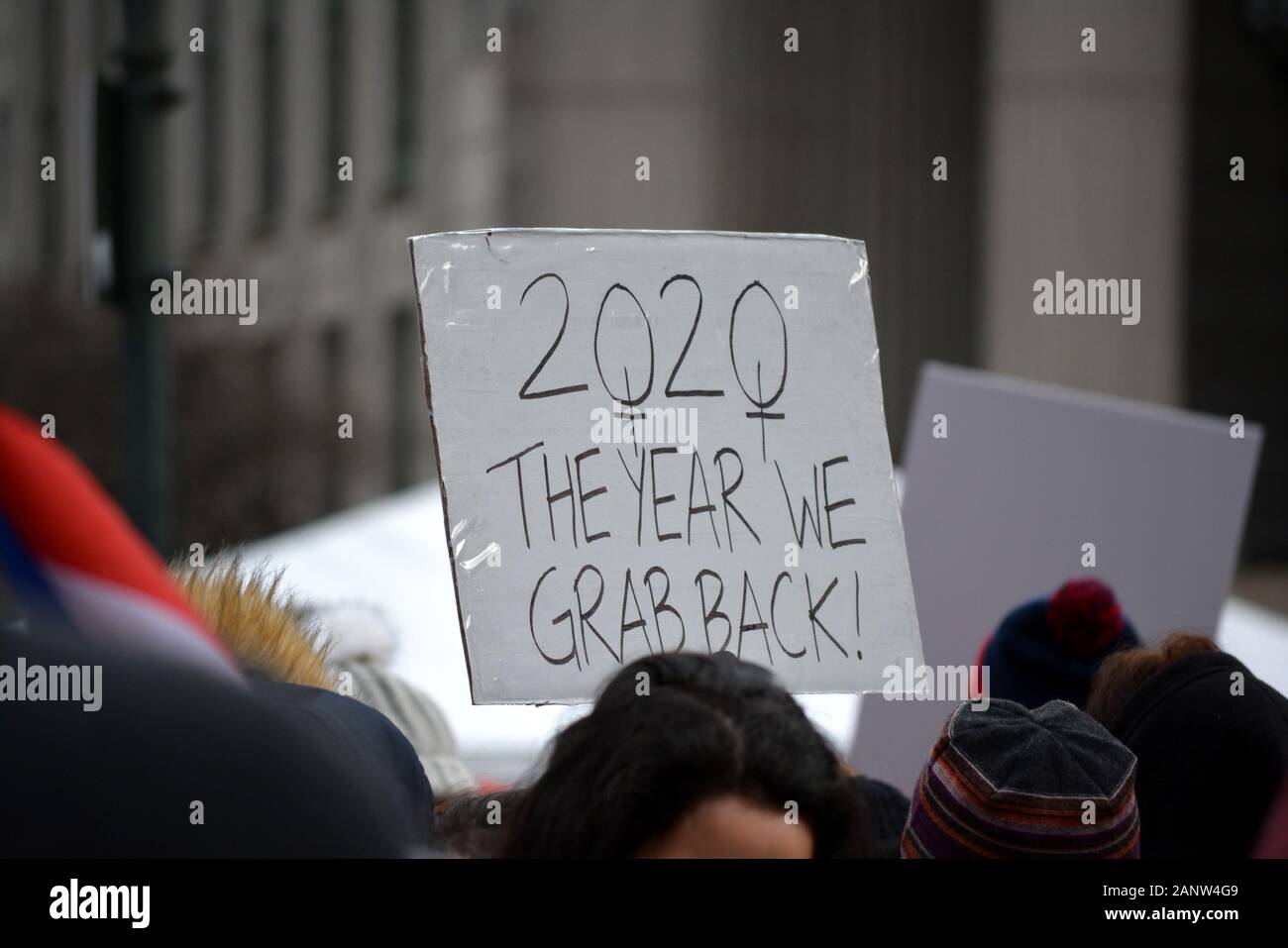 People holding signs at the "Rise and Roar" Women's March from Lower ...