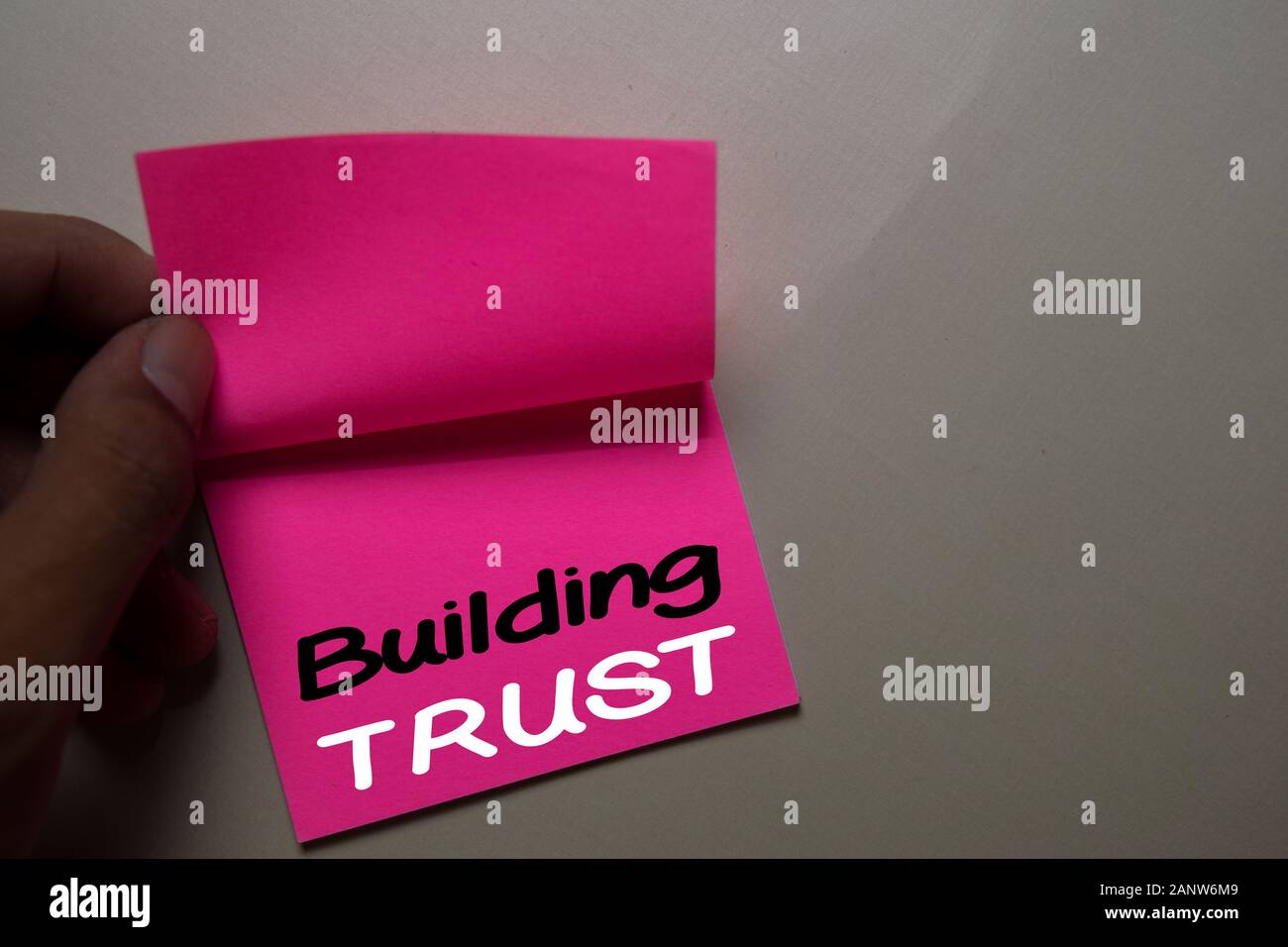 Building Trust write on a sticky note isolated on office desk Stock ...