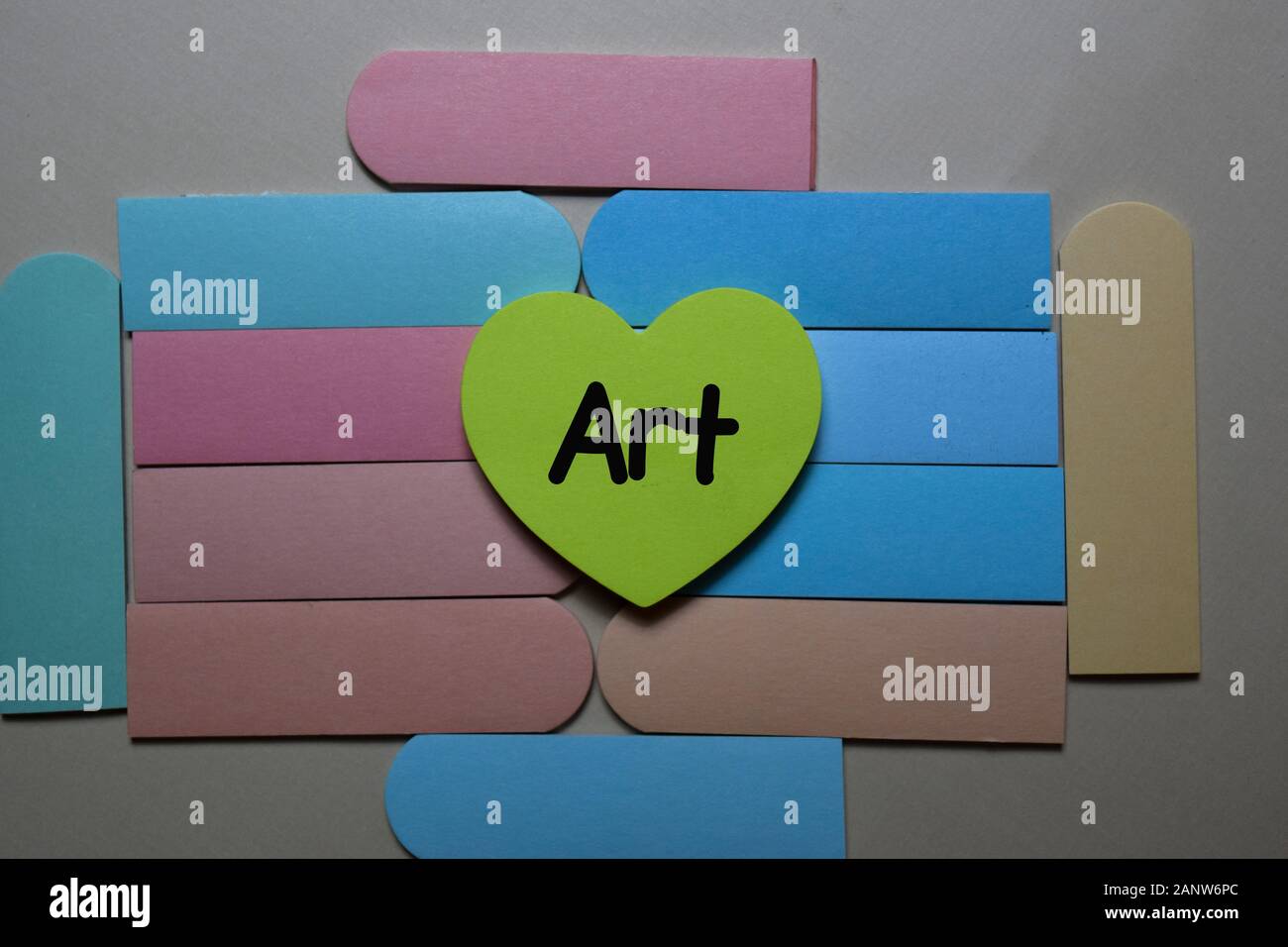 Art write on a sticky note isolated on office desk Stock Photo - Alamy