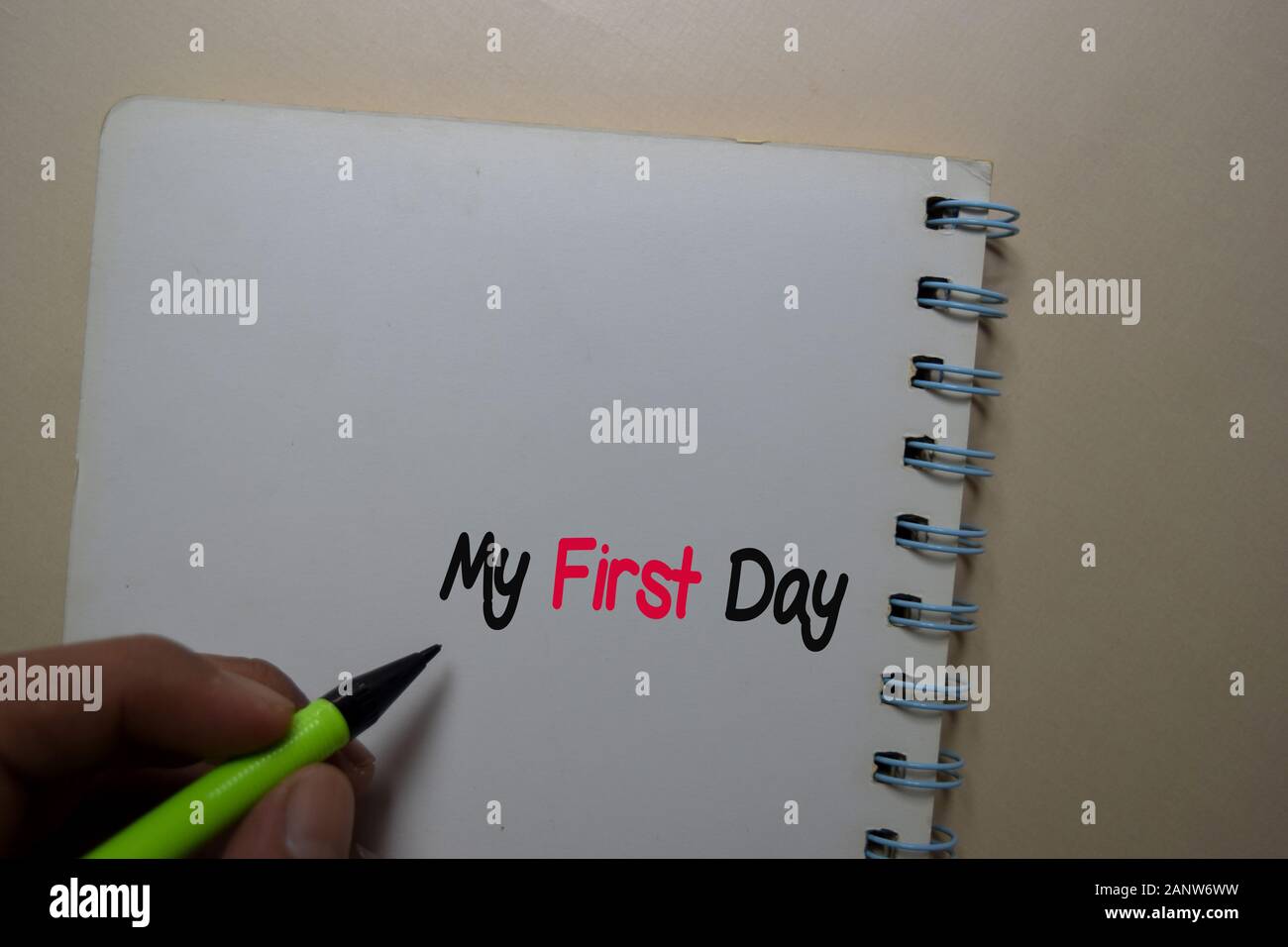 My First Day write on a book isolated on office desk Stock Photo - Alamy
