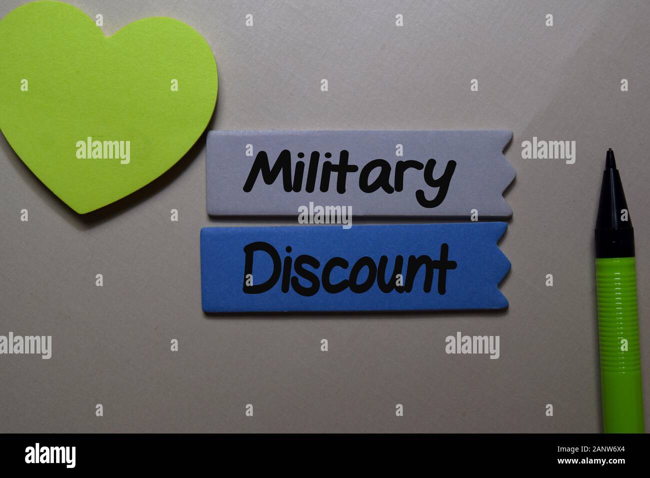 Military Discount write on a sticky note isolated on office desk Stock ...