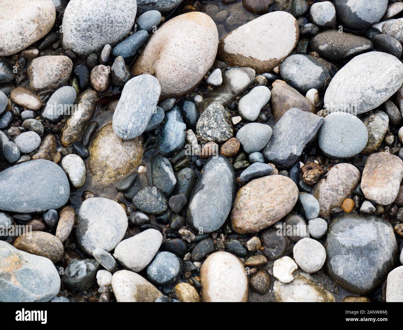 Background with large and small stones Stock Photo - Alamy