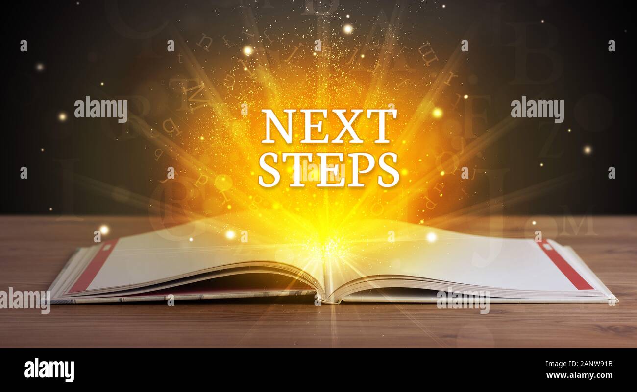 NEXT STEPS inscription coming out from an open book, educational ...