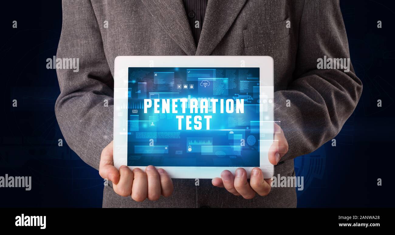 Young business person working on tablet and shows the digital sign ...