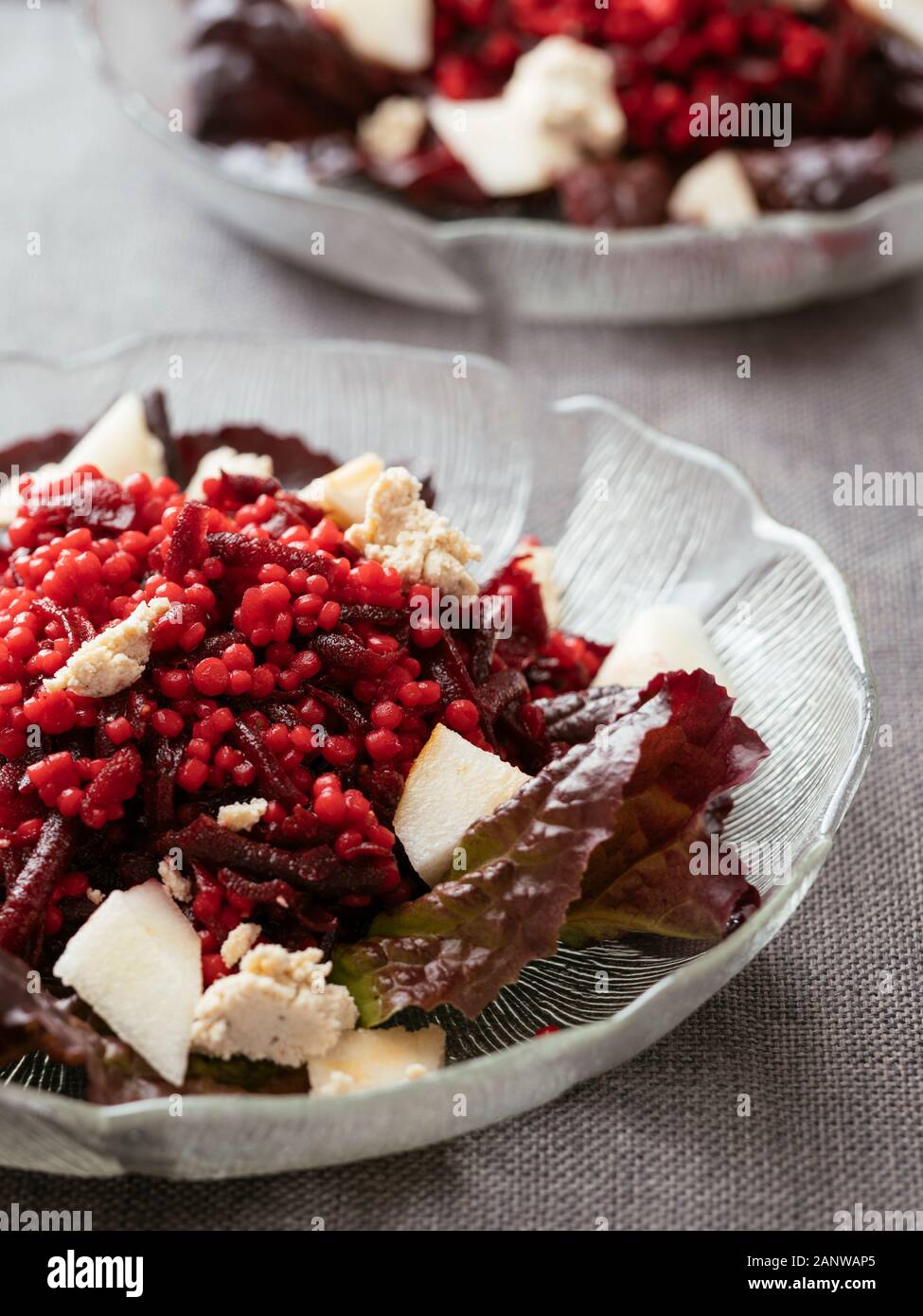Shoestring Beets with Pearl Couscous and Pears Stock Photo - Alamy
