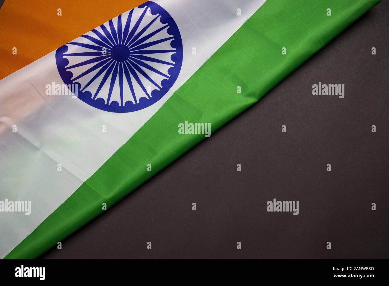 Top shot of Indian Flag on black background, tricolor, saffron, green ...