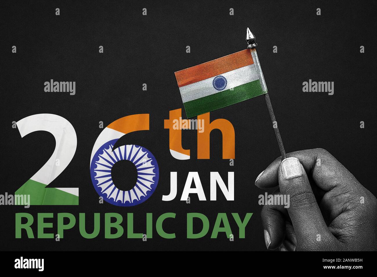 26th Jan Republic Day, Hand holding Indian flag on black background ...