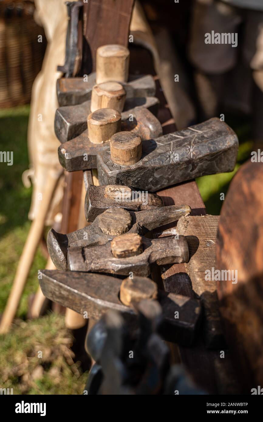 Forge in the open air during the living history festival. Hammers of ...