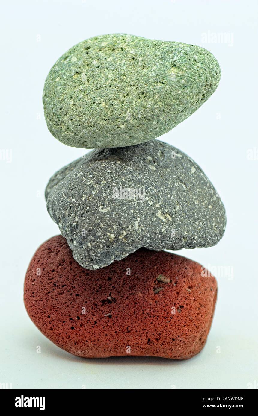 Heap of coloured volcanic rocks. Sign of balance Stock Photo - Alamy