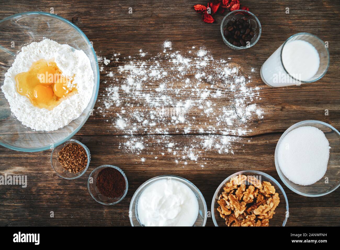 Bakery preparation in kitchen, dough recipe ingredients on vintage wood ...