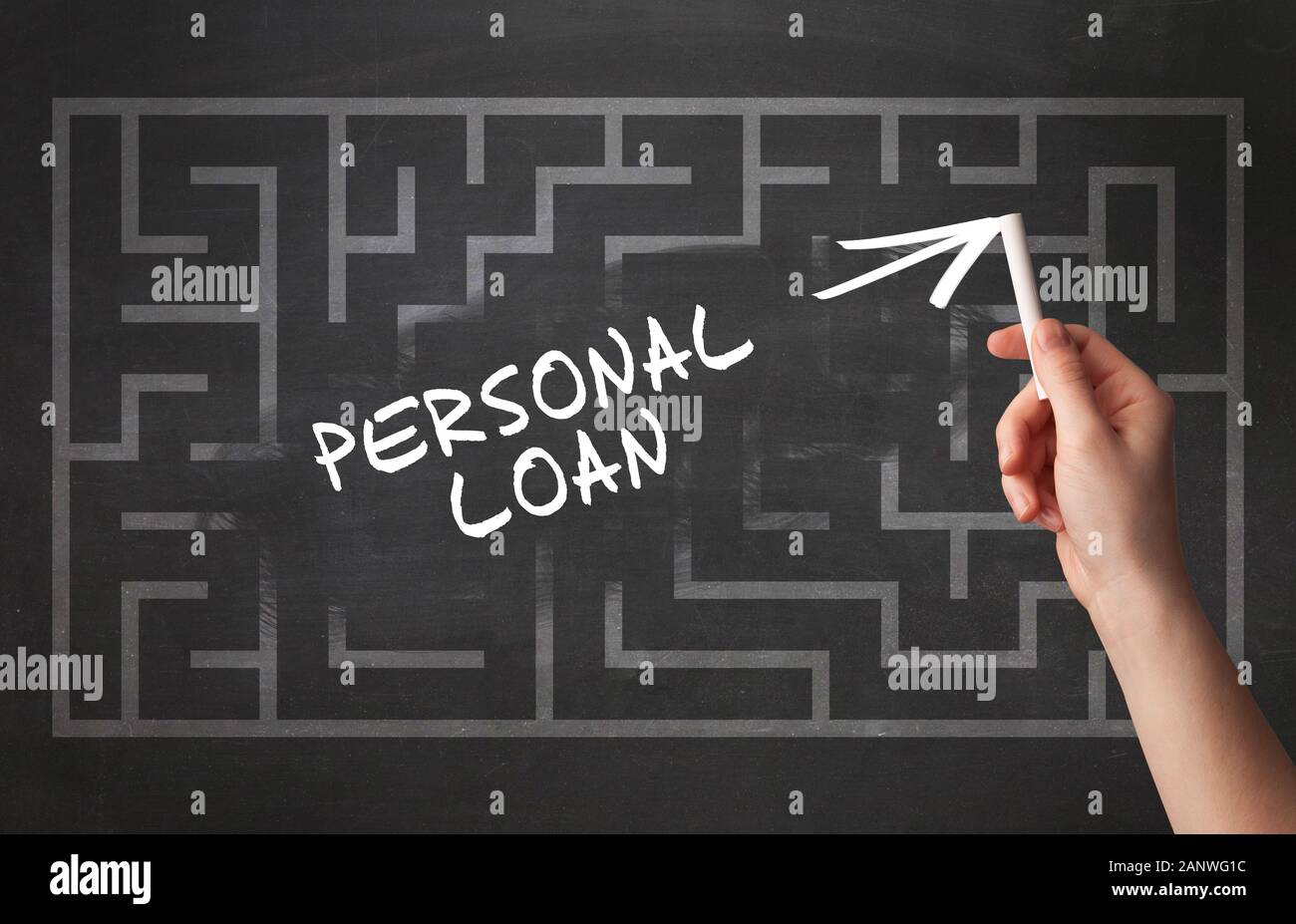 Hand drawing PERSONAL LOAN inscription with white chalk on blackboard ...