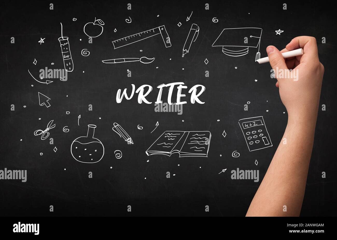 Hand drawing WRITER inscription with white chalk on blackboard ...