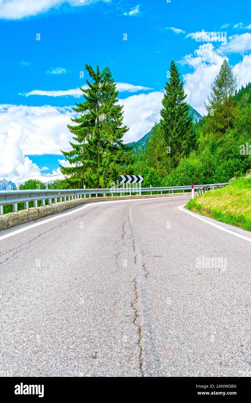 Mountain road curve in Italian Dolomites Alps Stock Photo - Alamy