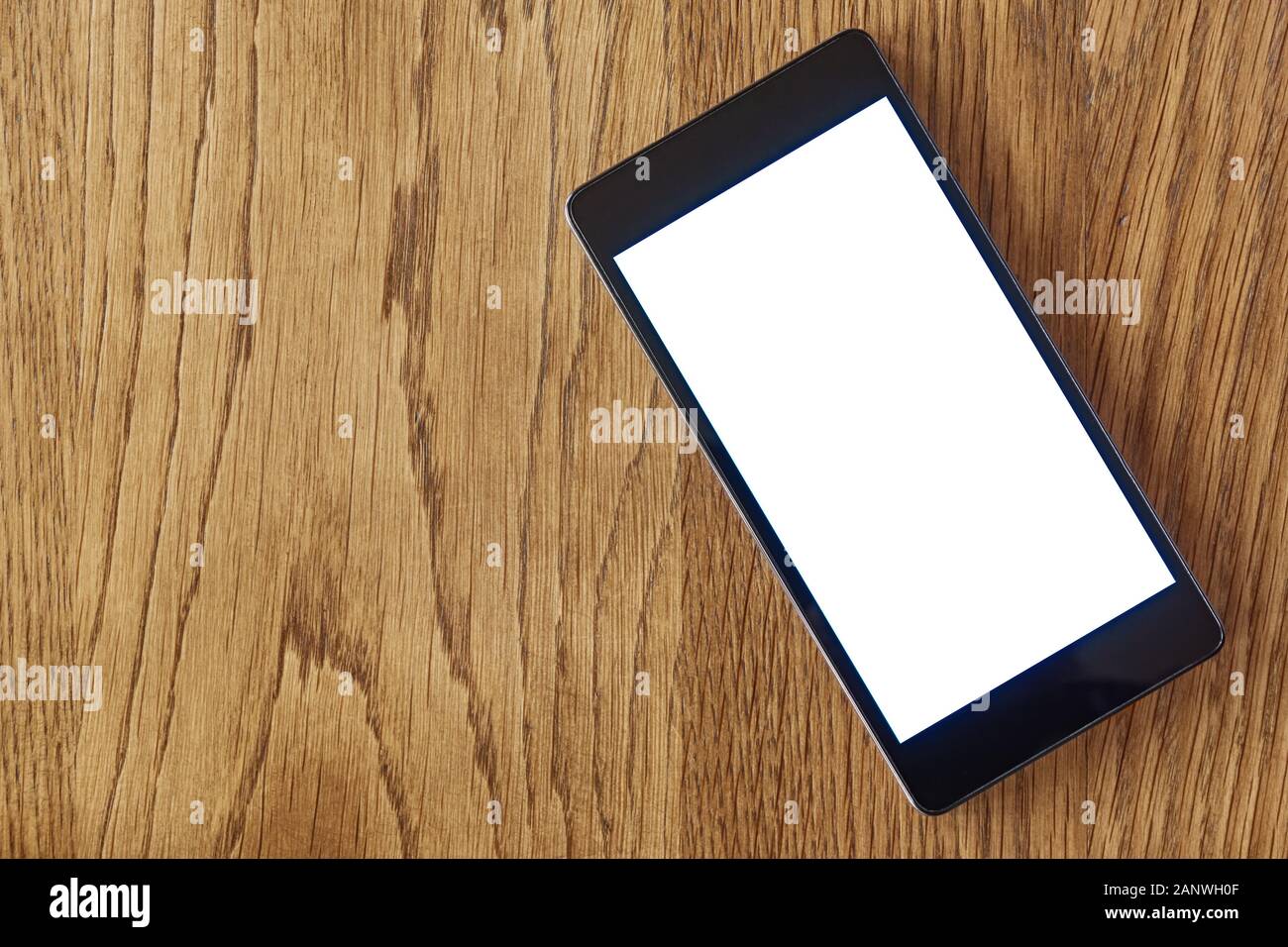 Smartphone with blank white screen on wooden table. Flat lay mobile ...