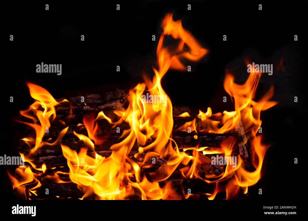 Fire and Flames. Burning firewood in the fireplace. Burning fire wood ...