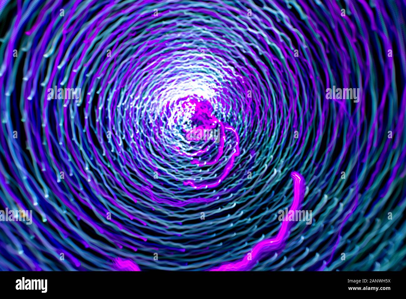 Colorful lights swirl with a long camera exposure Stock Photo - Alamy