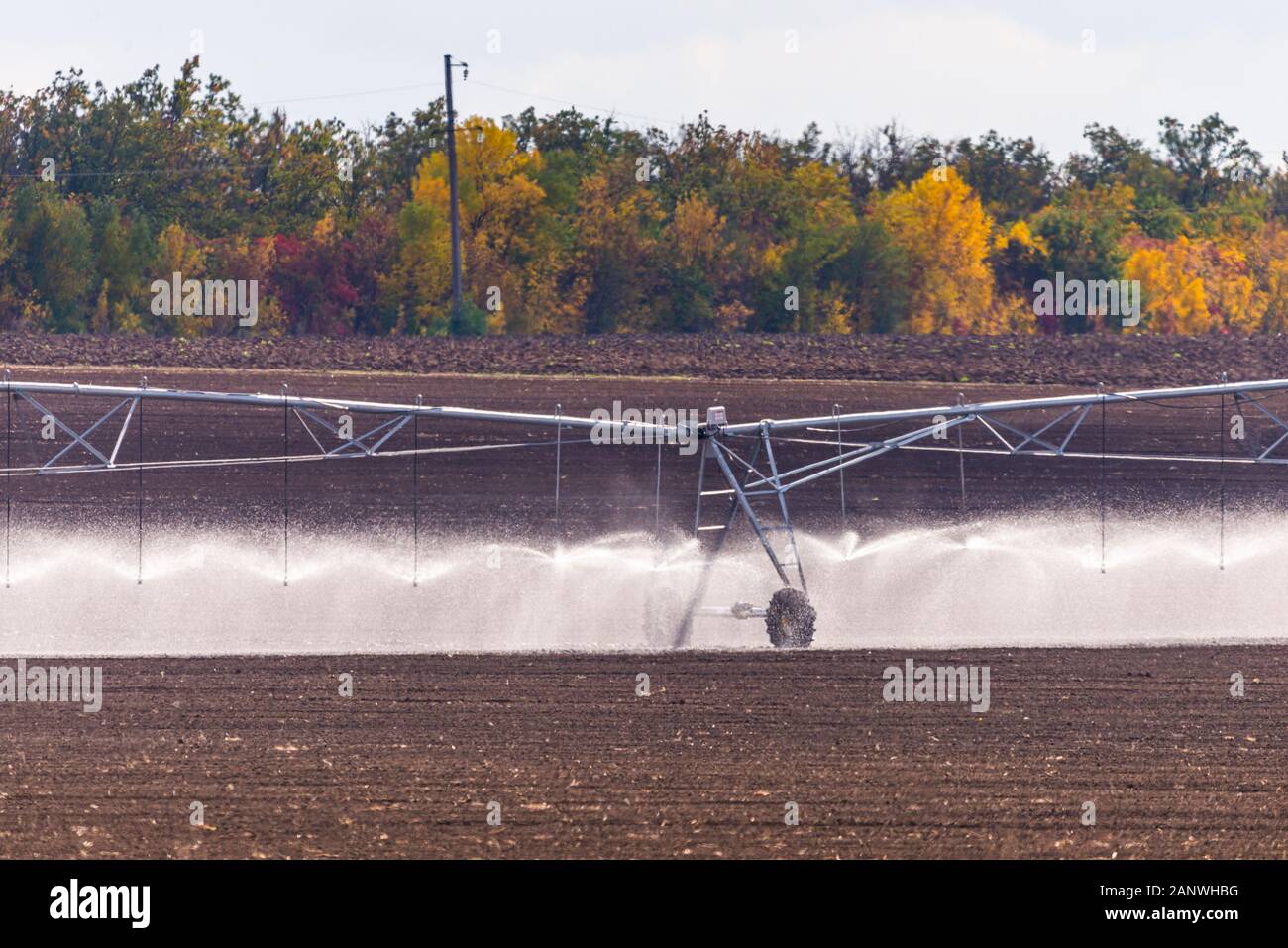 Modern irrigation system watering a farm field Stock Photo - Alamy